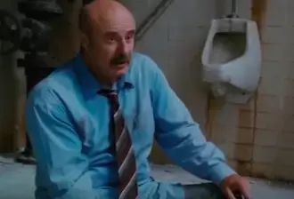 Lub Ntiaj Teb DC nyuam qhuav ntxiv tus cwj pwm tshiab… Dr. Phil?